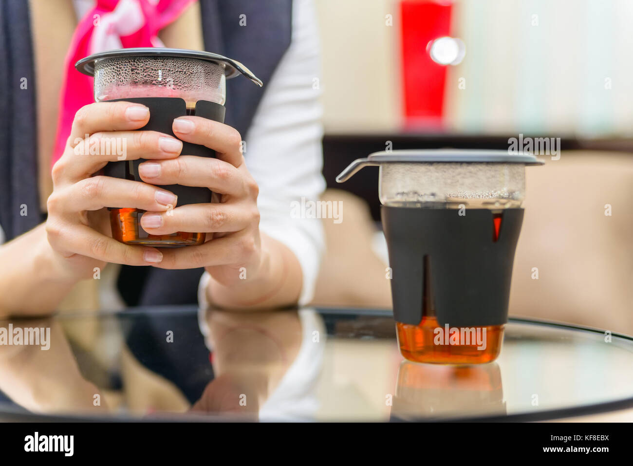 Female hands hold a cup of tea Stock Photo - Alamy
