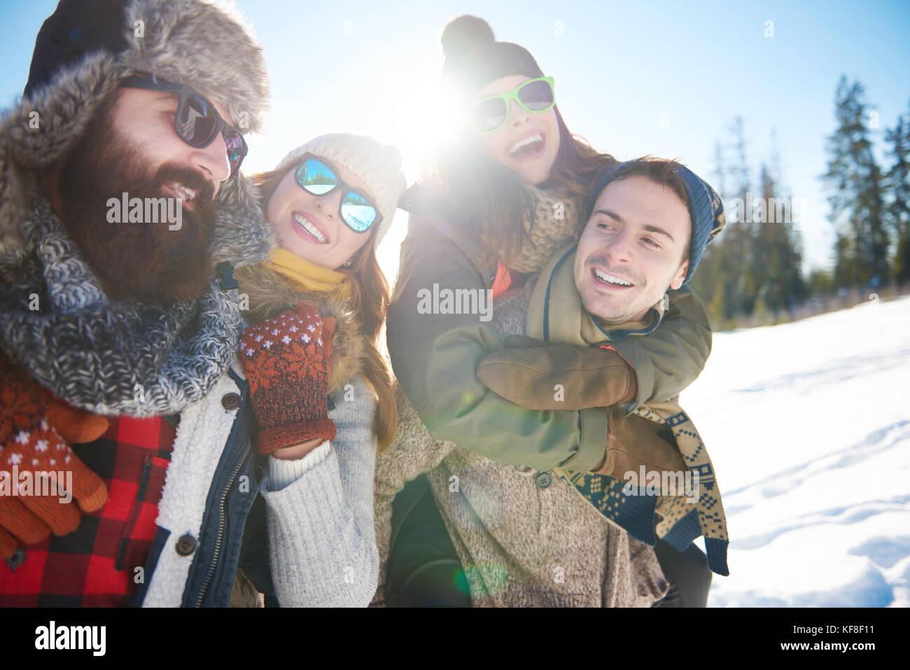 Friends enjoying winter holidays together Stock Photo - Alamy