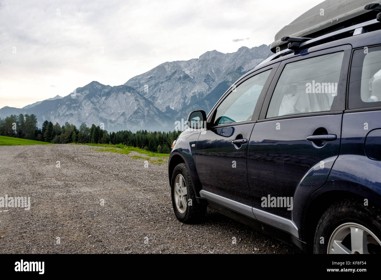 car for traveling with a mountain road Stock Photo - Alamy