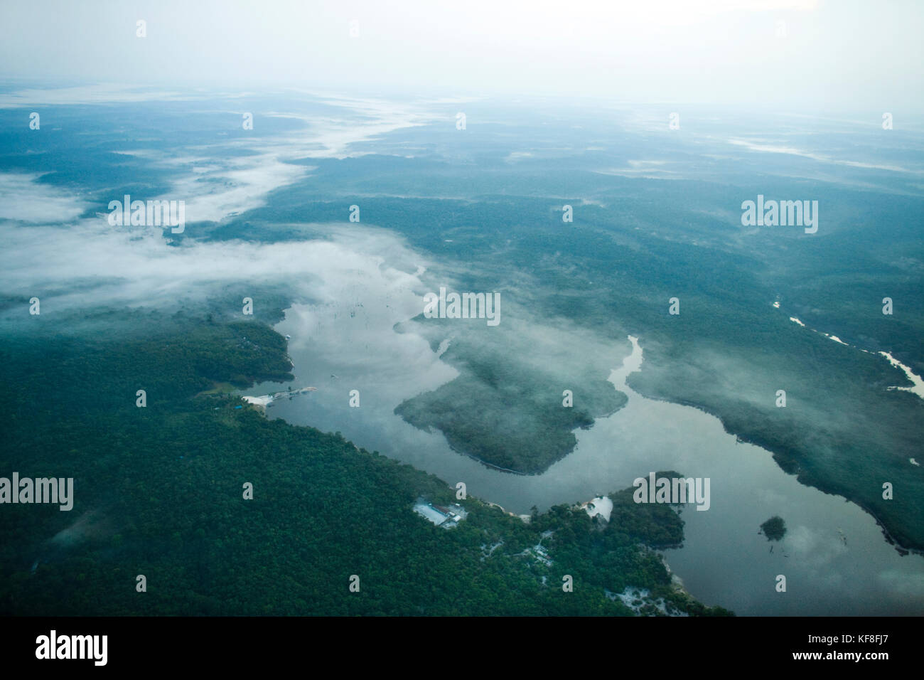 BRAZIL, Amazon Jungle landscape with morning fog, shot from an airplane ...