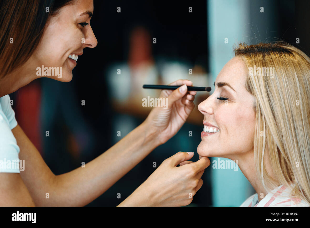 Portrait of beautiful woman getting cosmetic care at beauty salo Stock ...