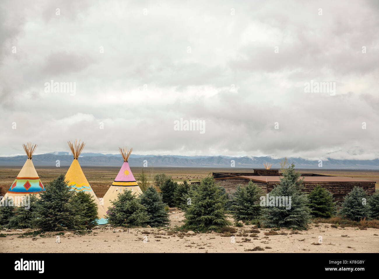 USA, Nevada, Wells, colorful tipis are scattered all over Mustang ...