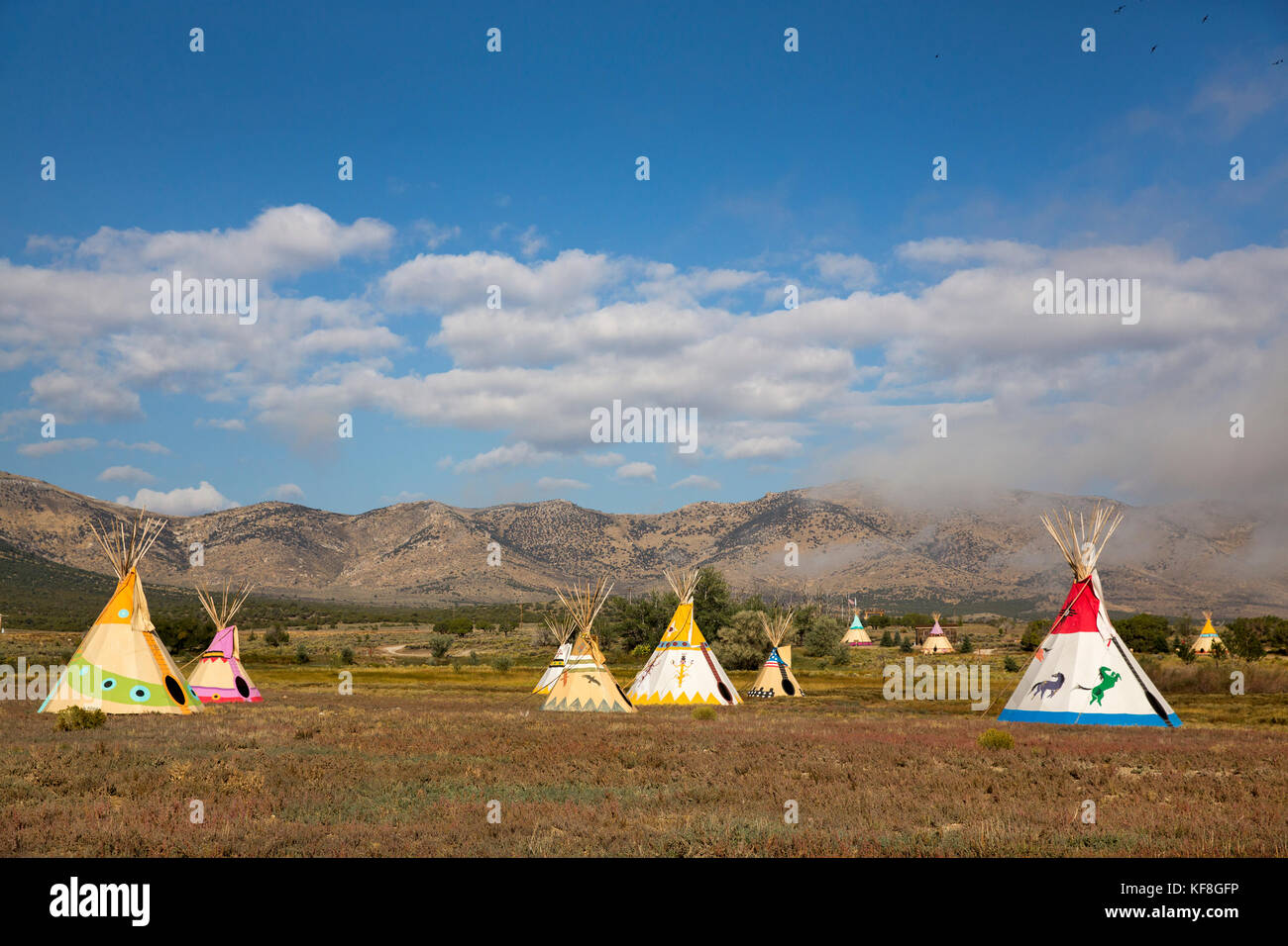 USA, Nevada, Wells, colorful tipis are scattered all over Mustang ...