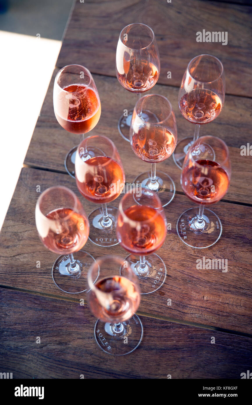 USA, Oregon, Willamette Valley, poured glasses of Brut Rose at Soter ...