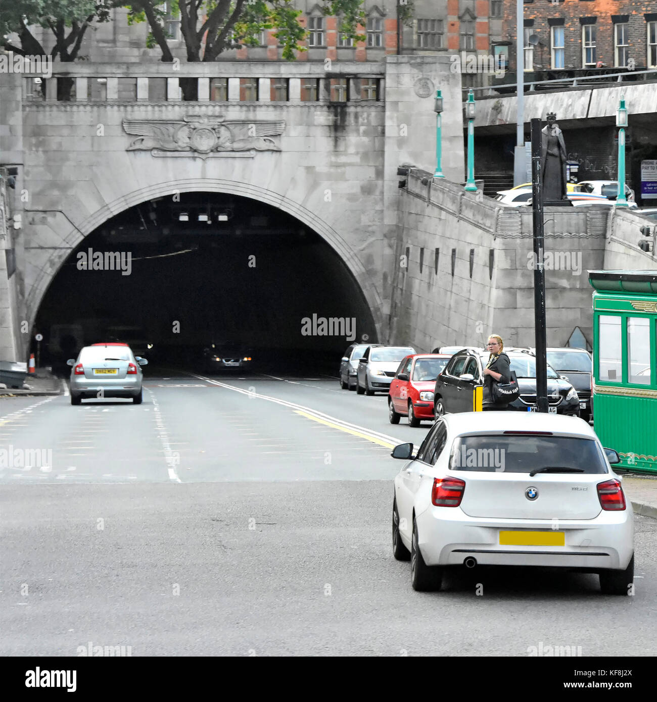 Road traffic & pedestrian at entrance to The Queensway Tunnel under ...