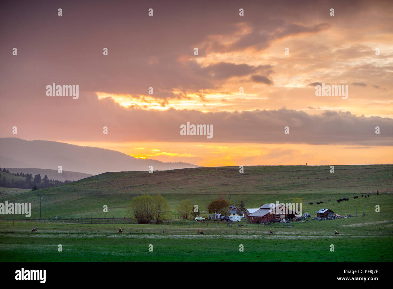 USA, Oregon, Enterprise, a beautiful farm nestles up against the ...