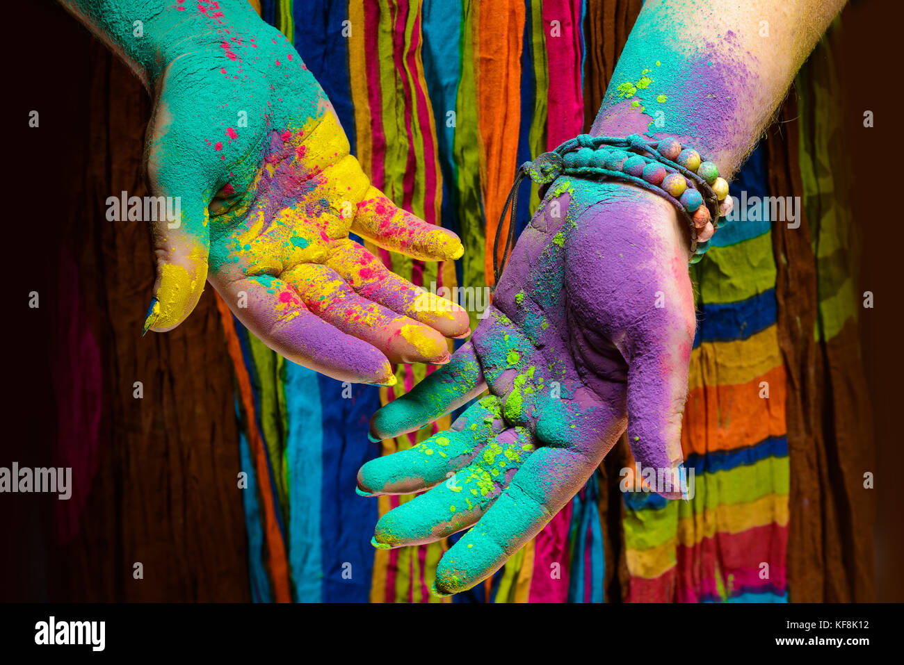 Holi painted hands Stock Photo - Alamy