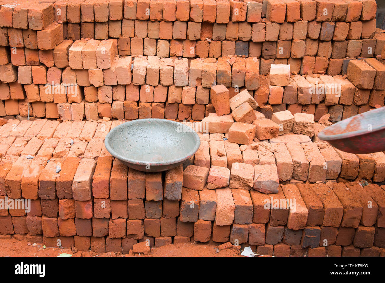 The red brick building, hand made, for house construction, India Stock ...