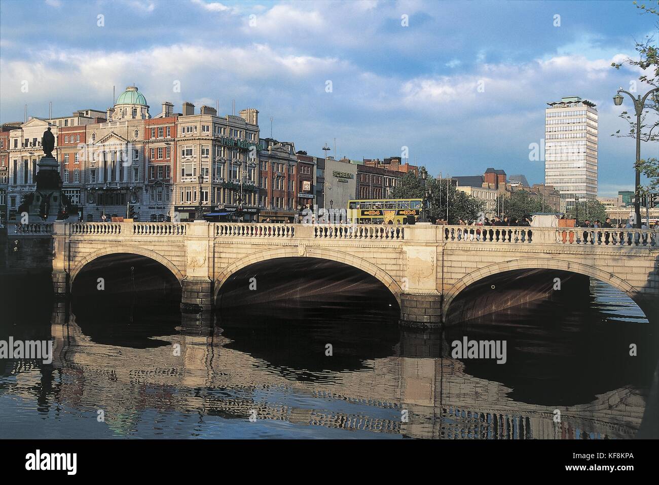 Reflection of an arch bridge in water, O'Connell Bridge, Dublin ...