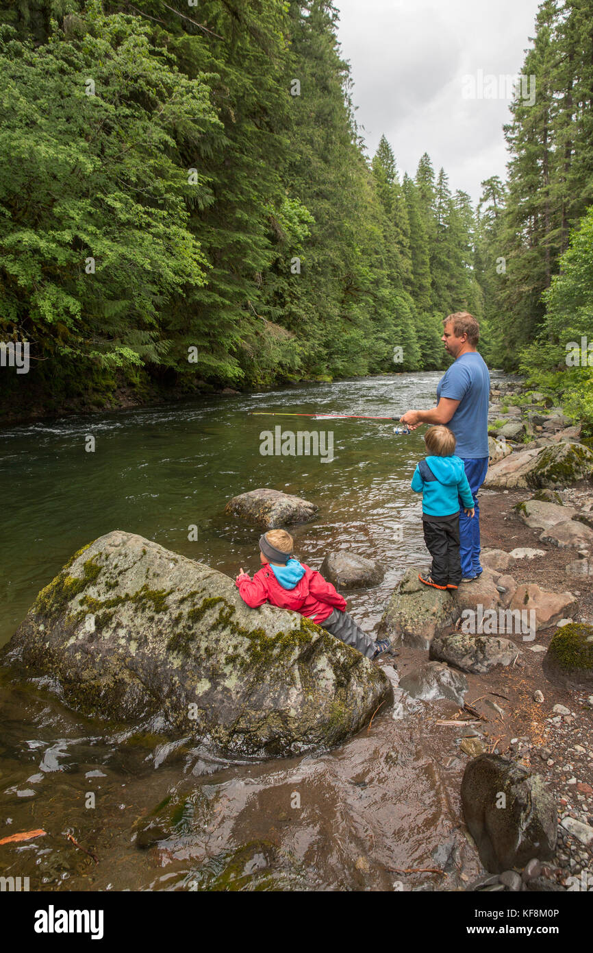 USA, Oregon, Santiam River, Brown Cannon, young boys learning how to ...