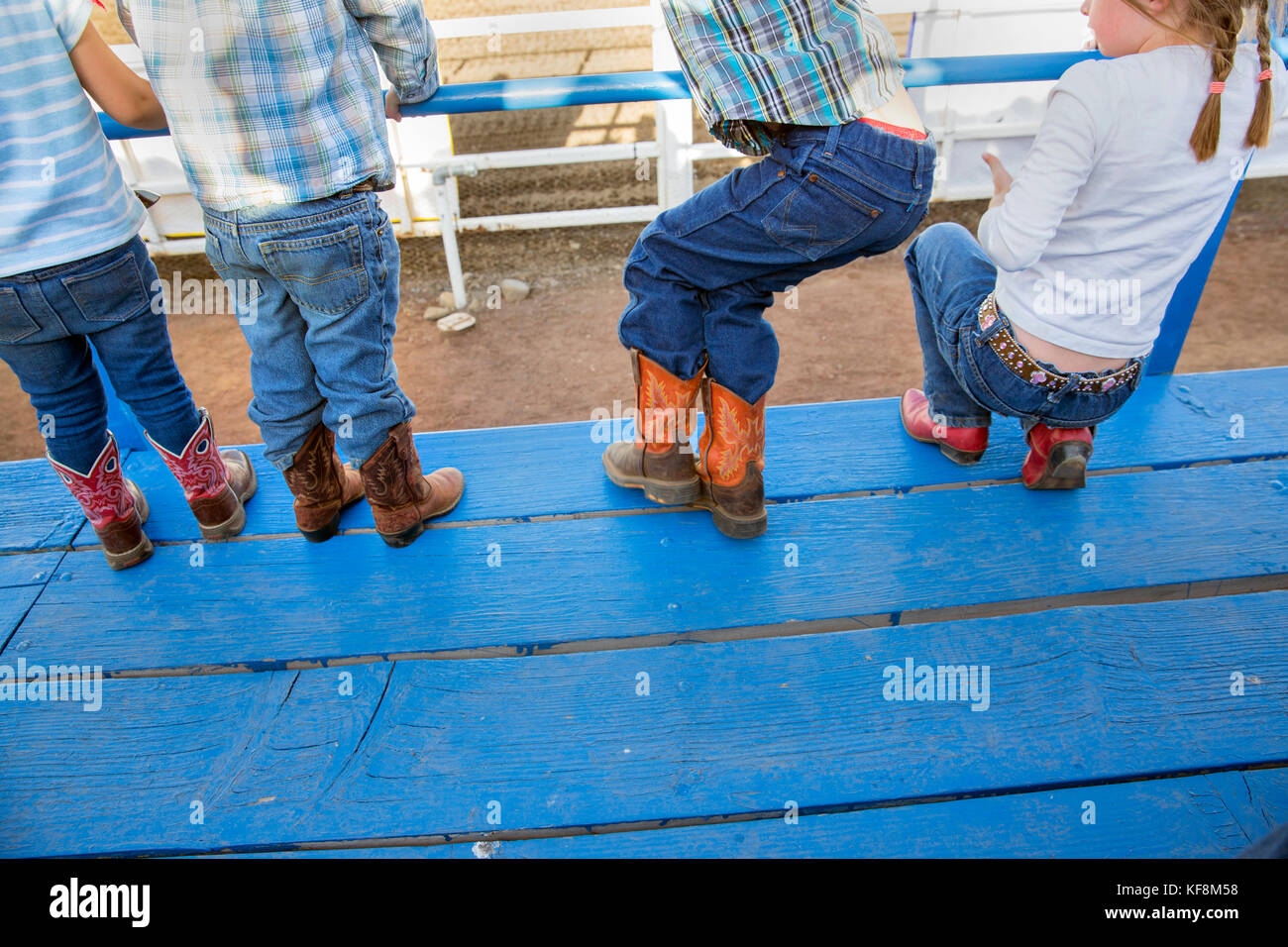 USA, Oregon, Sisters, Sisters Rodeo, children watching the events at ...