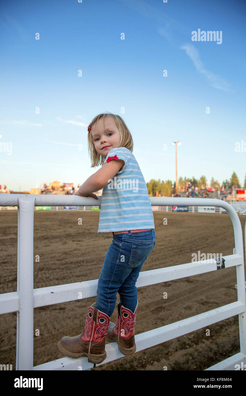USA, Oregon, Sisters, Sisters Rodeo, children watching the events at ...