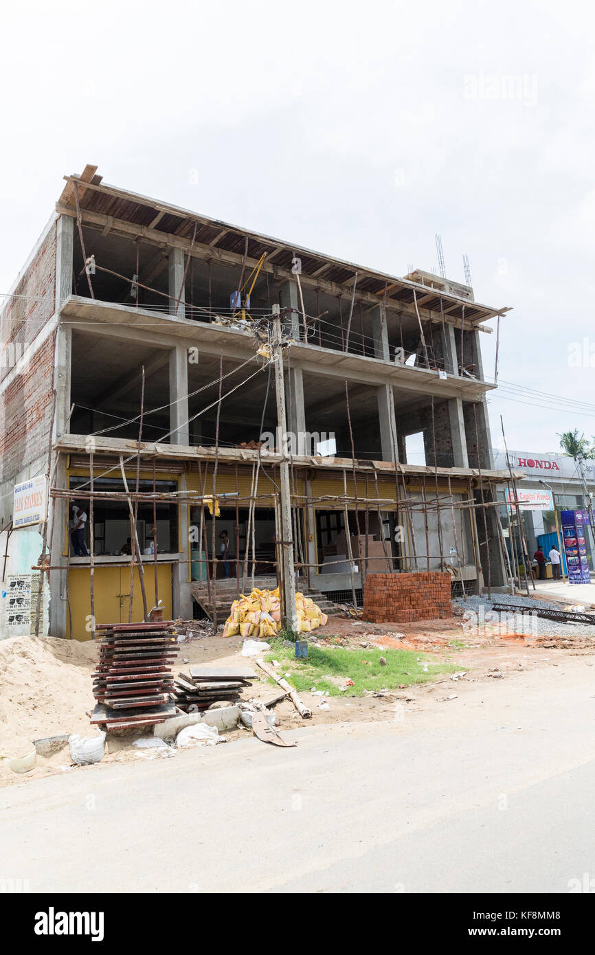 Being built house , not finish but already lived. India Stock Photo - Alamy