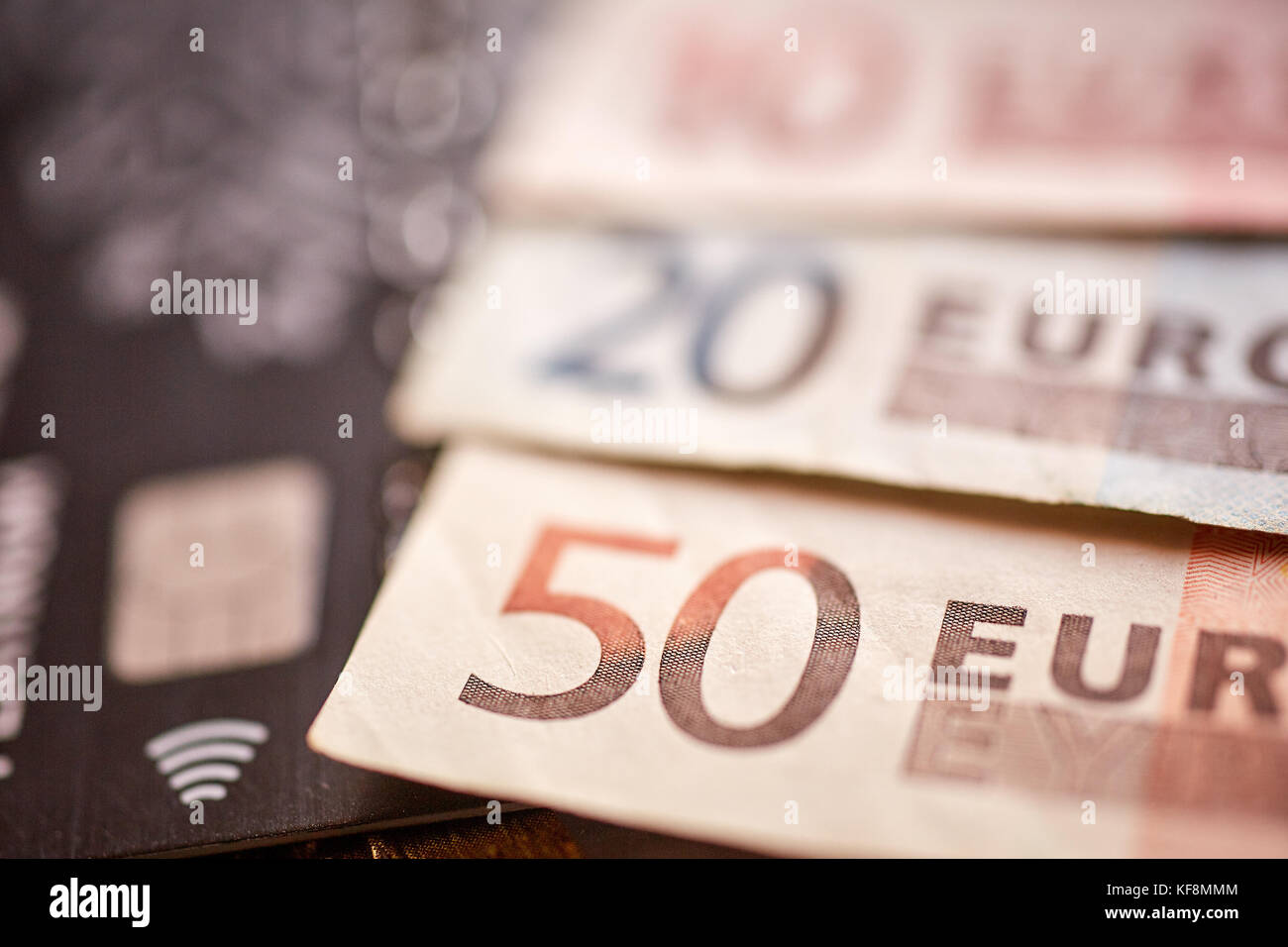 Euro bills and credit card background Stock Photo - Alamy
