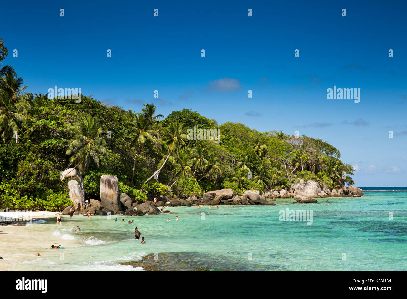 The Seychelles, Mahe, Anse Royale, Ile Souris, beach, swimmers and ...