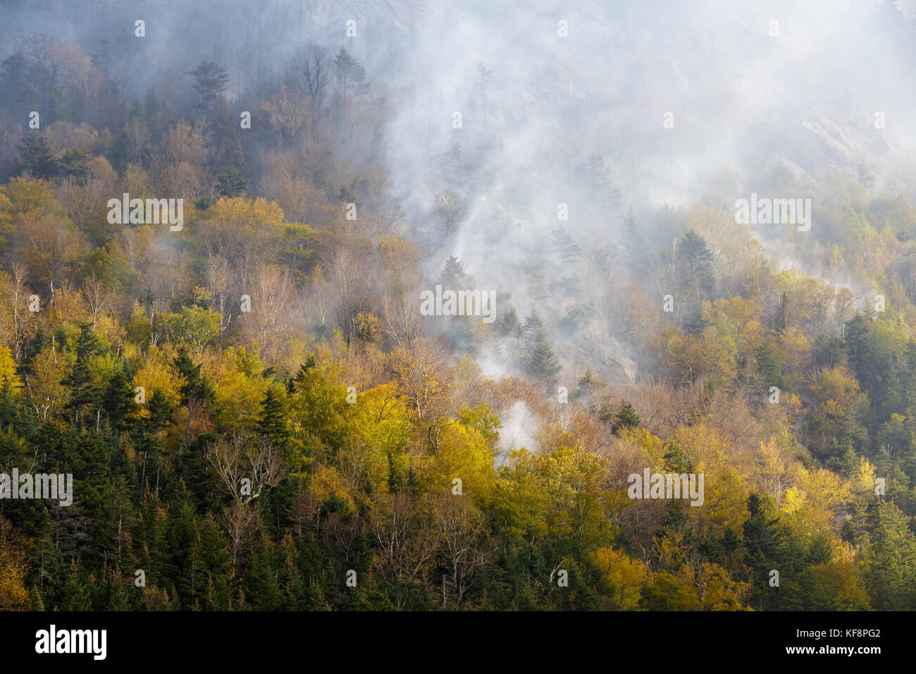 Smoke from a forest fire on Dilly Cliff in Kinsman Notch, New Hampshire ...