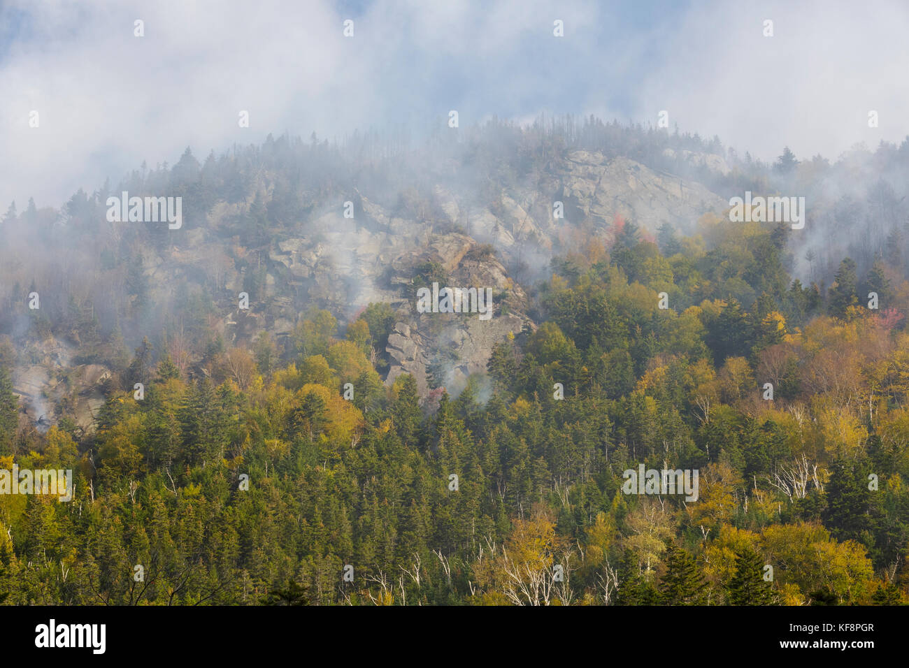 Smoke from a forest fire on Dilly Cliff in Kinsman Notch New Hampshire ...