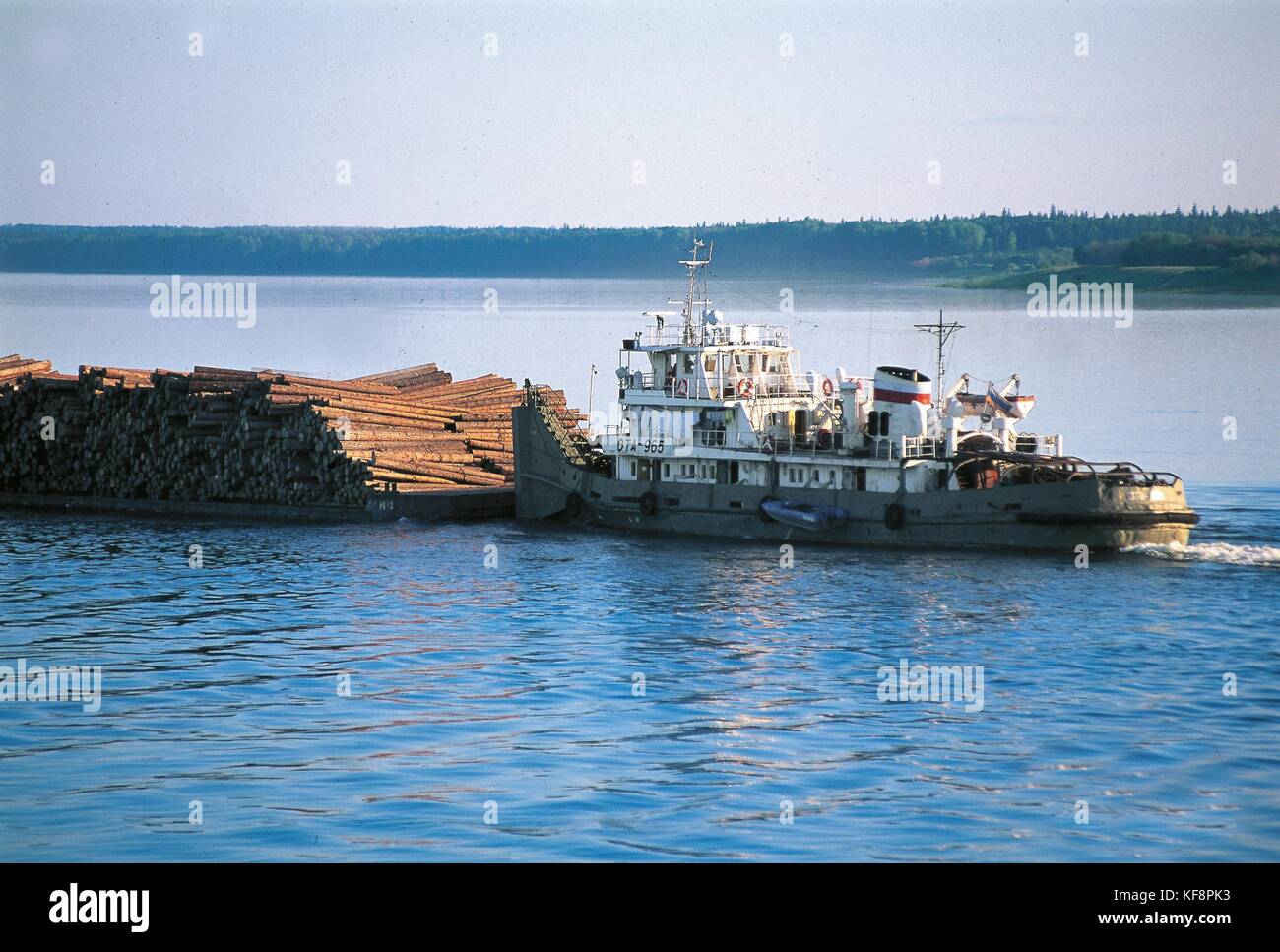 Russia, Siberia, Wood transportation on the Jenisej River Stock Photo ...