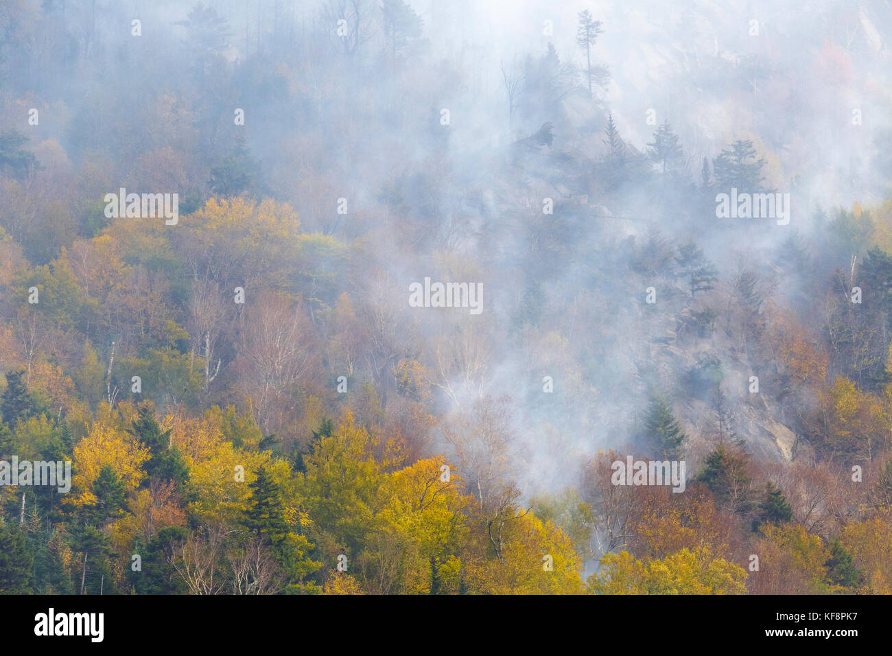 Smoke from a forest fire on Dilly Cliff in Kinsman Notch, New Hampshire ...
