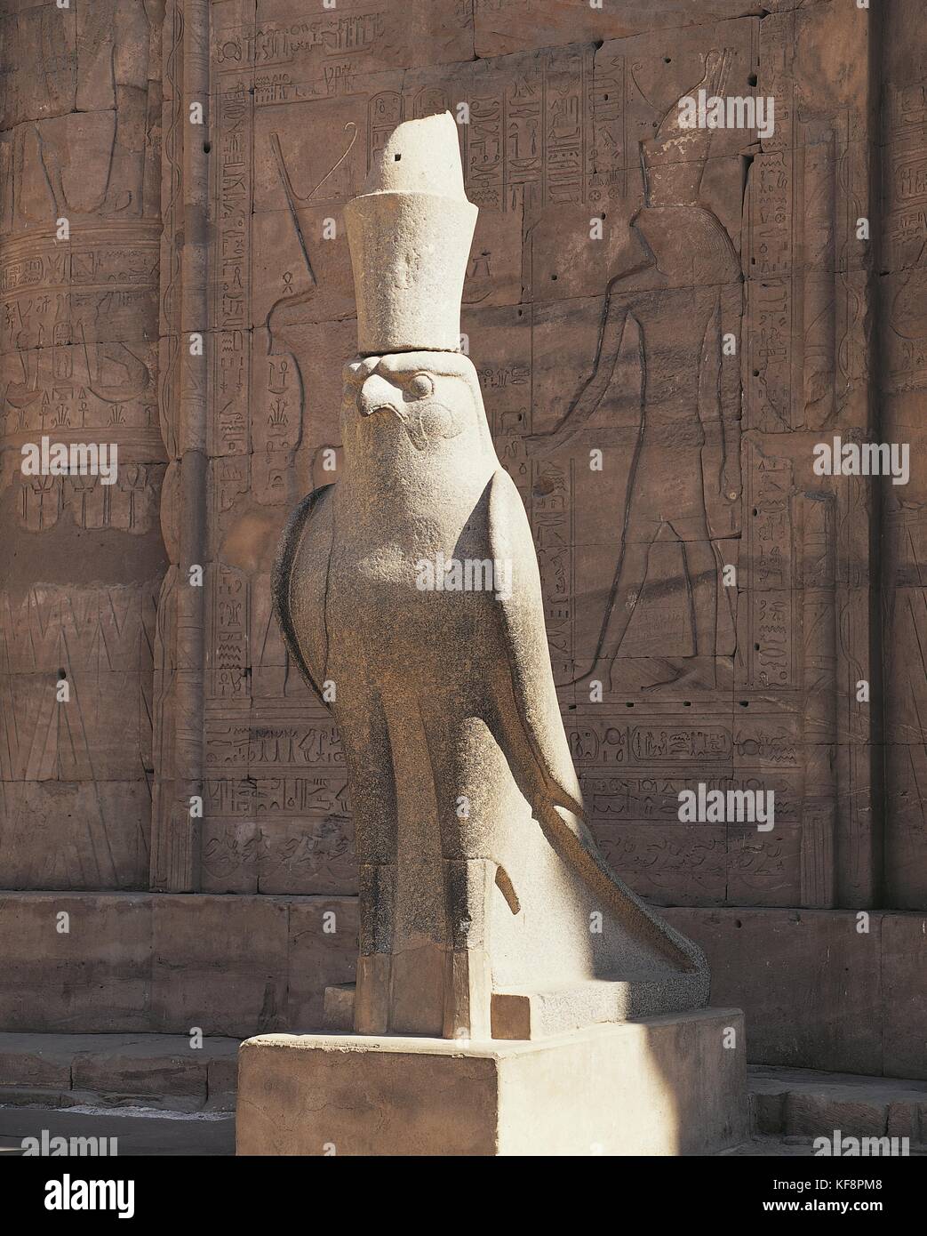 Egypt, Idfu (Edfu). Temple of Horus. Statue of Horus in the form of ...
