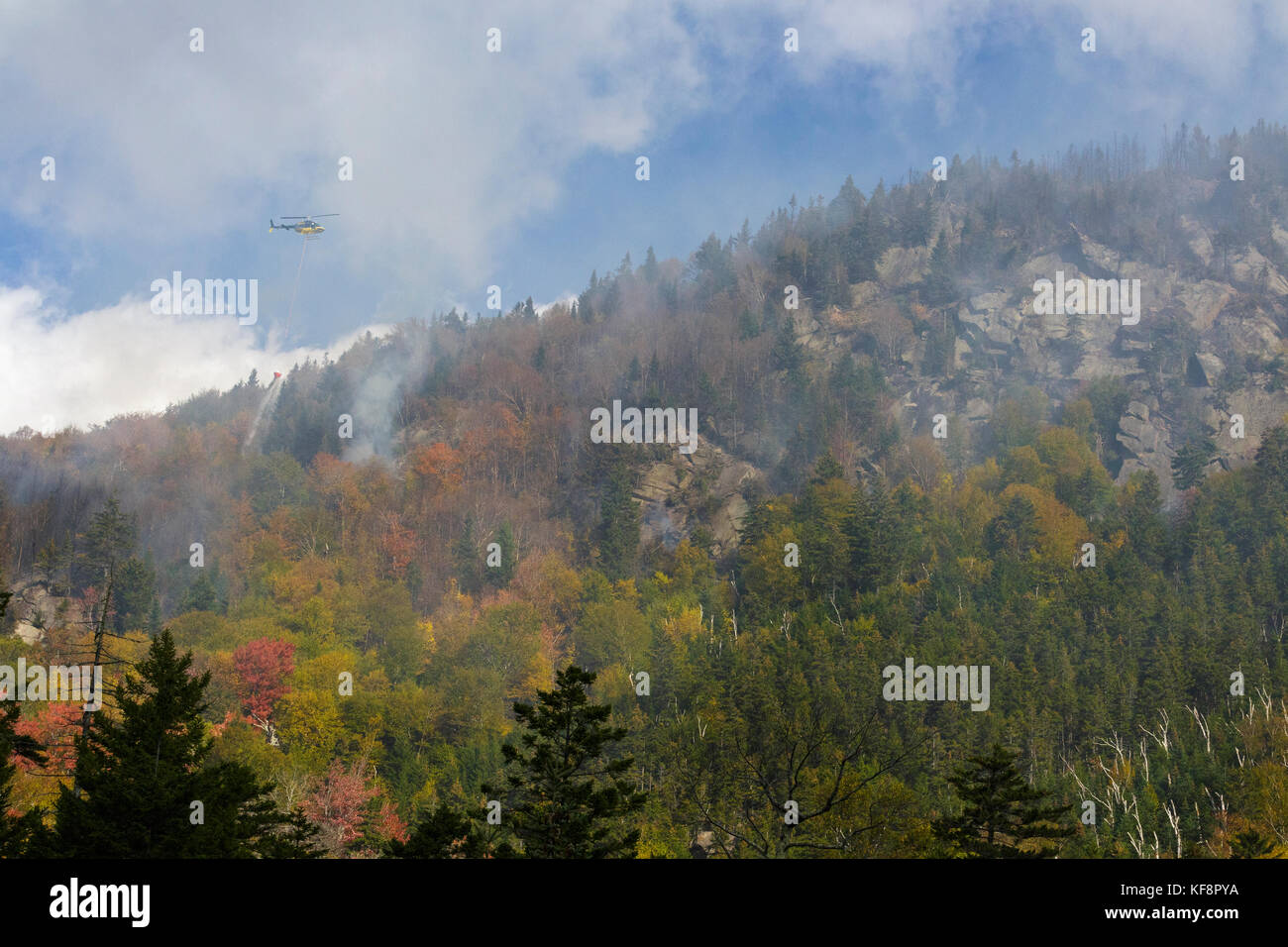 Smoke from a forest fire on Dilly Cliff in Kinsman Notch New Hampshire ...