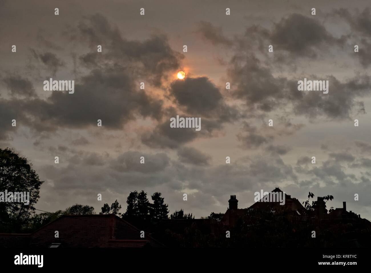 Dramatic red sky and sun caused by dust in the atmosphere from the ...