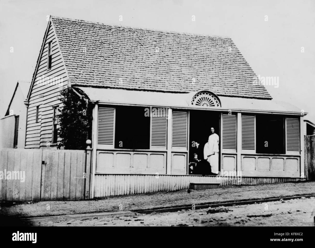 This historical image shows a cottage in Brisbane, circa 1872. The ...