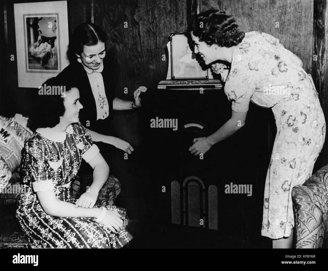 Gathered around radio hi-res stock photography and images - Alamy