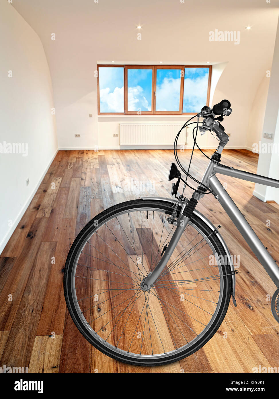 Modern interior with wooden floor and Bike in foreground Stock Photo ...