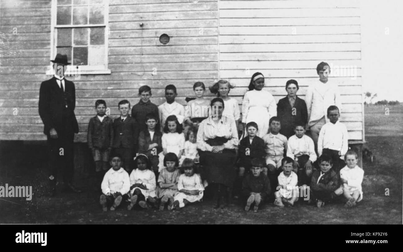 This photograph shows students and teachers at Hebel State School ...