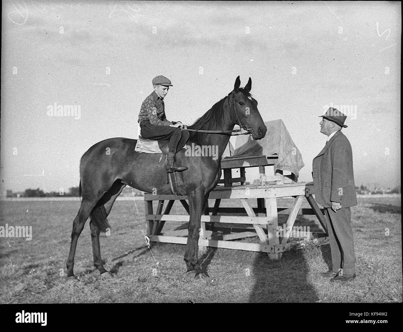 The image depicts trainers and horses in Randwick, Australia, known for ...
