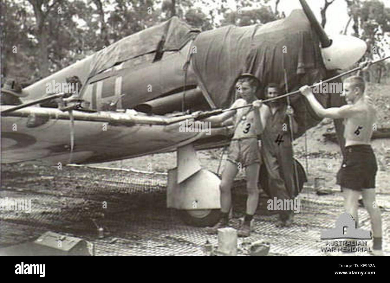 Cleaning guns of 83 Squadron RAAF Boomerang Nov 1943 AWM 060743 Stock ...