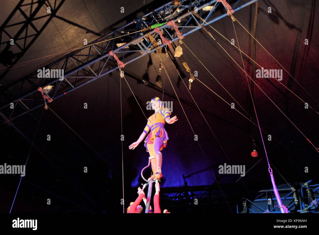 circus swaying pole act Stock Photo - Alamy
