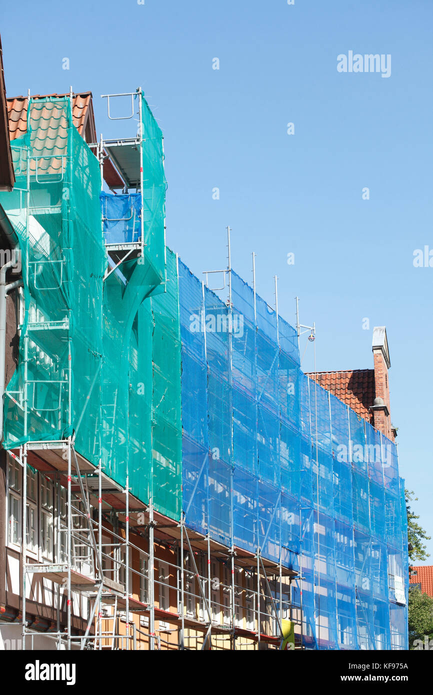 Construction site, old building, protective net Stock Photo - Alamy