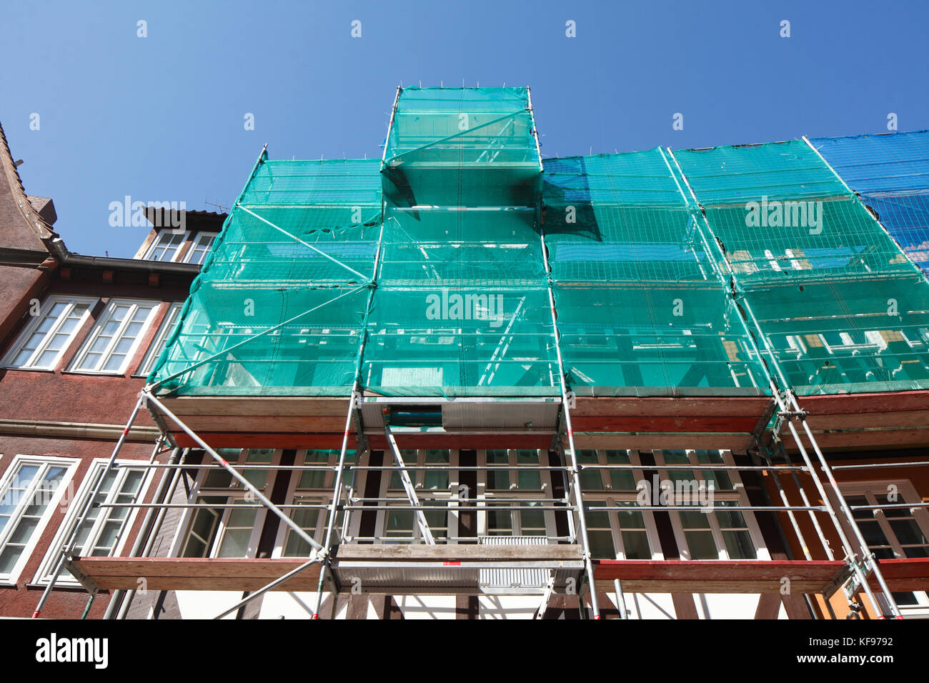 Construction site, old building, protective net Stock Photo - Alamy