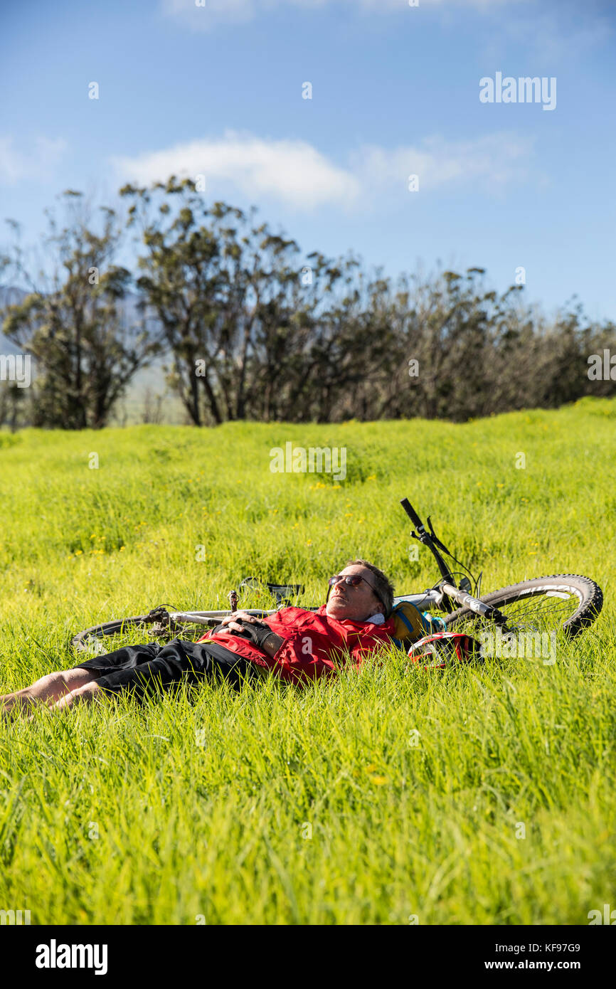 USA, Hawaii, The Big Island, journalist Daniel Duane takes a rest after ...