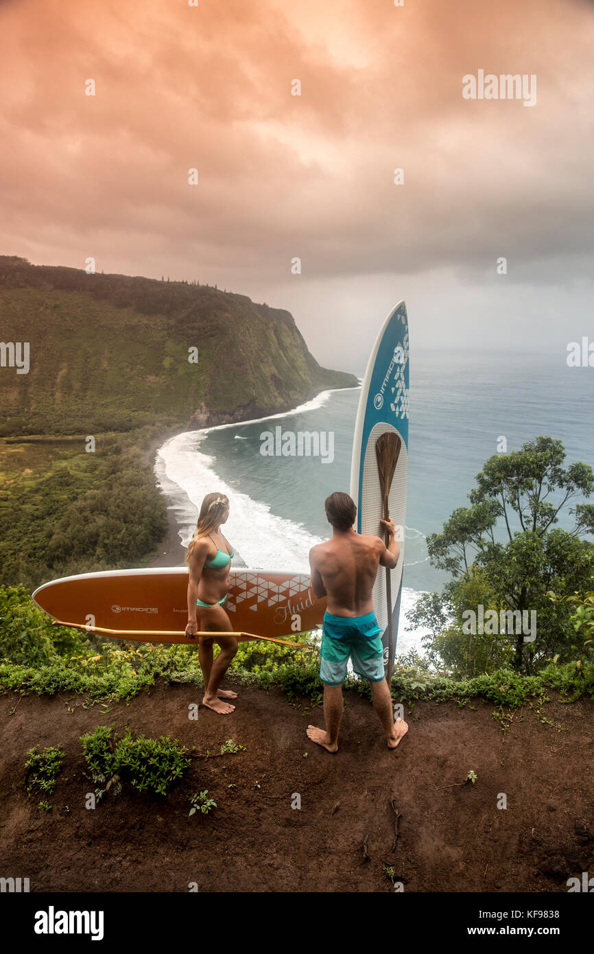 USA, Hawaii, The Big Island, paddle boarders scope out the Waipio ...