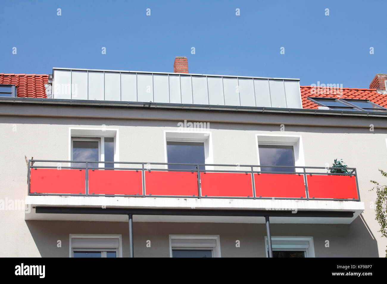 windows and red balcony of a modern Residential building Stock Photo ...