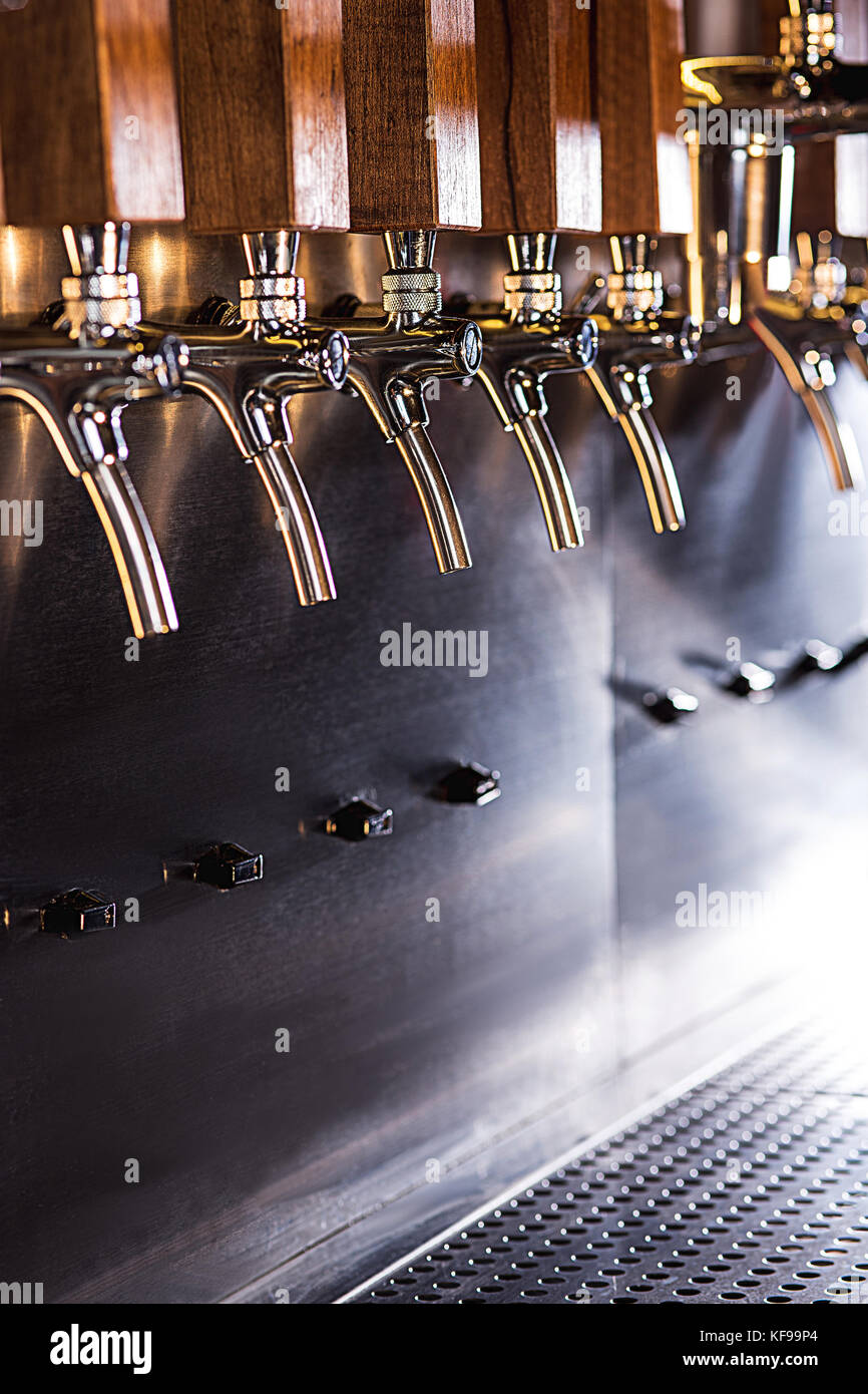Beer taps in a pub Stock Photo - Alamy