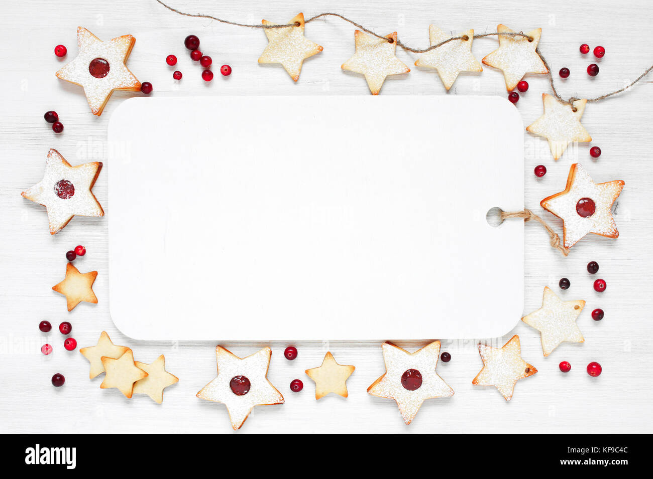 Background with traditional Linzer cookies - stars with red jam ...