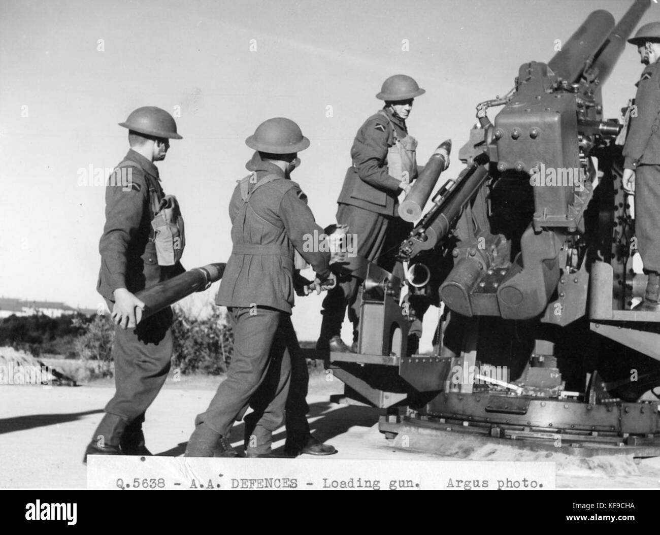 Gun crew loading Black and White Stock Photos & Images - Alamy