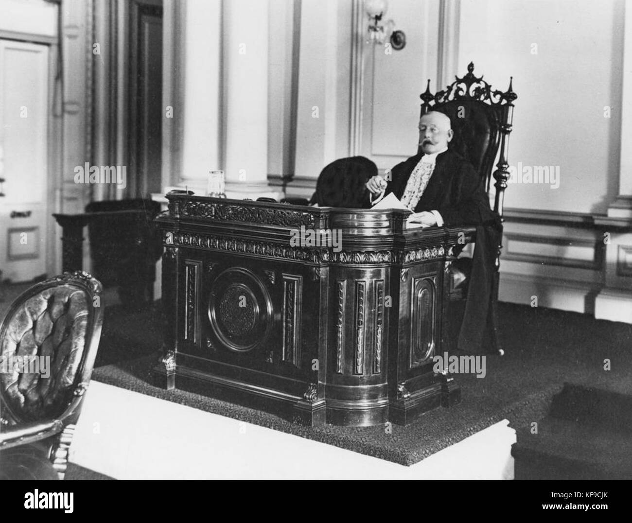 Sir Alfred Cowley speaker of the Queensland Legislative Assembly seated ...
