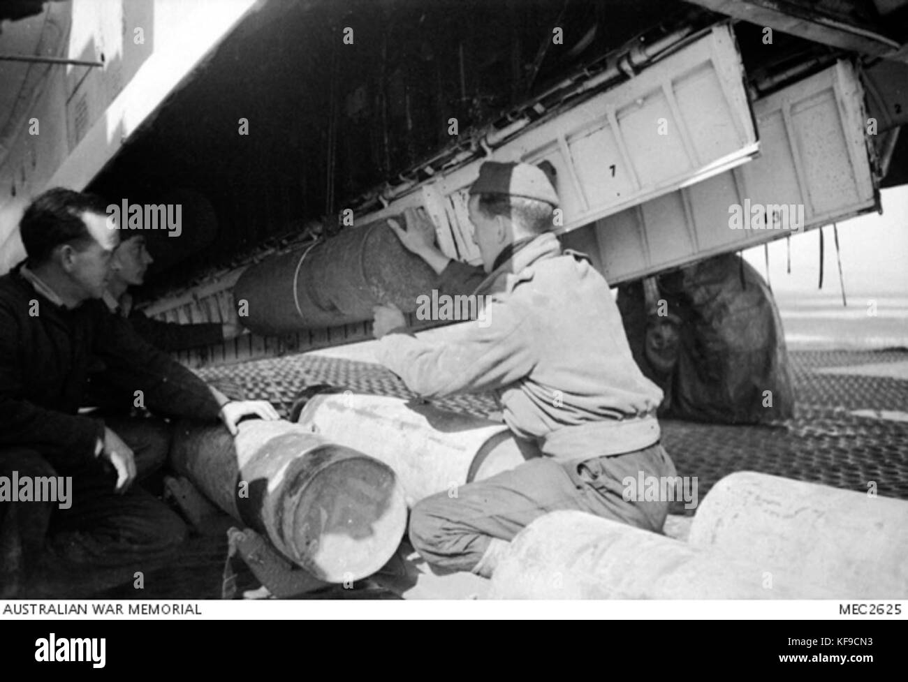 Loading depth charges into 458 Squadron RAAF Wellington Algeria WWII ...