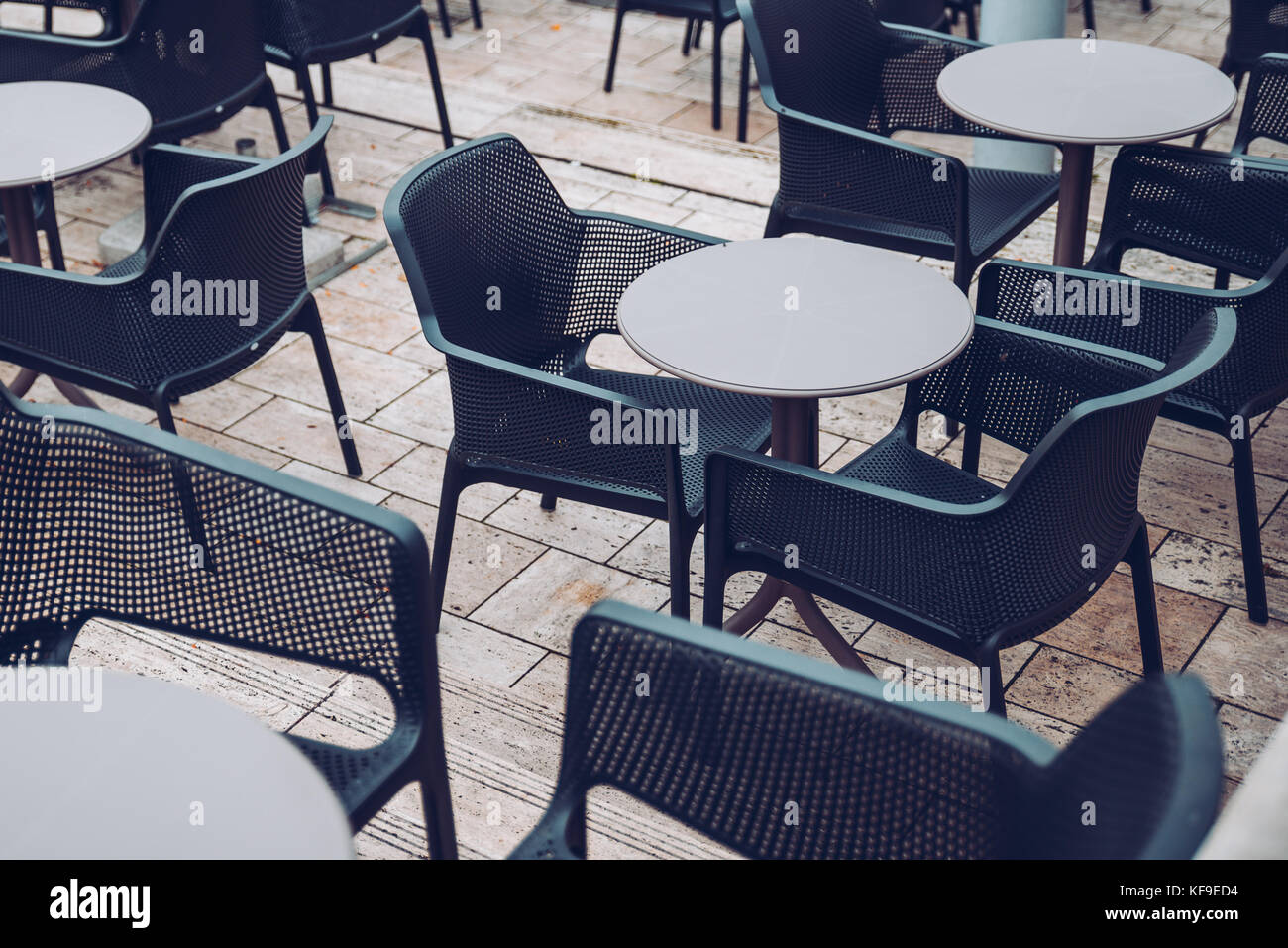 modern empty cafe exterior outside plastic tables Stock Photo - Alamy