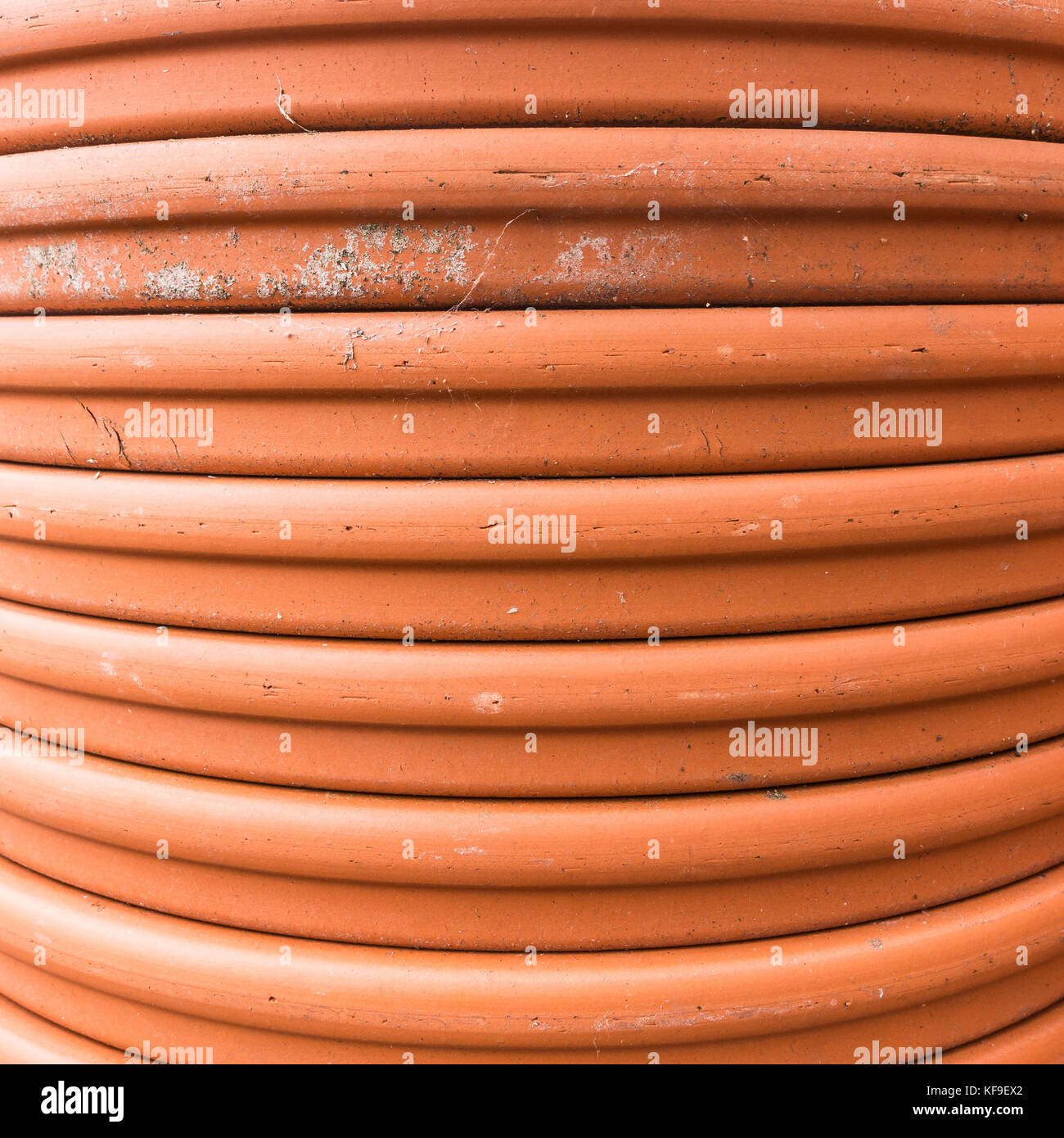 An abstract shot of a stack of terracotta pots Stock Photo - Alamy