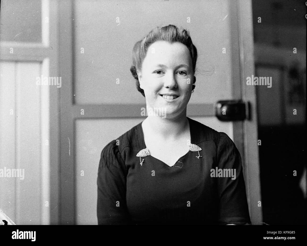 This photograph depicts staff from the toy department of Grace Bros, a ...