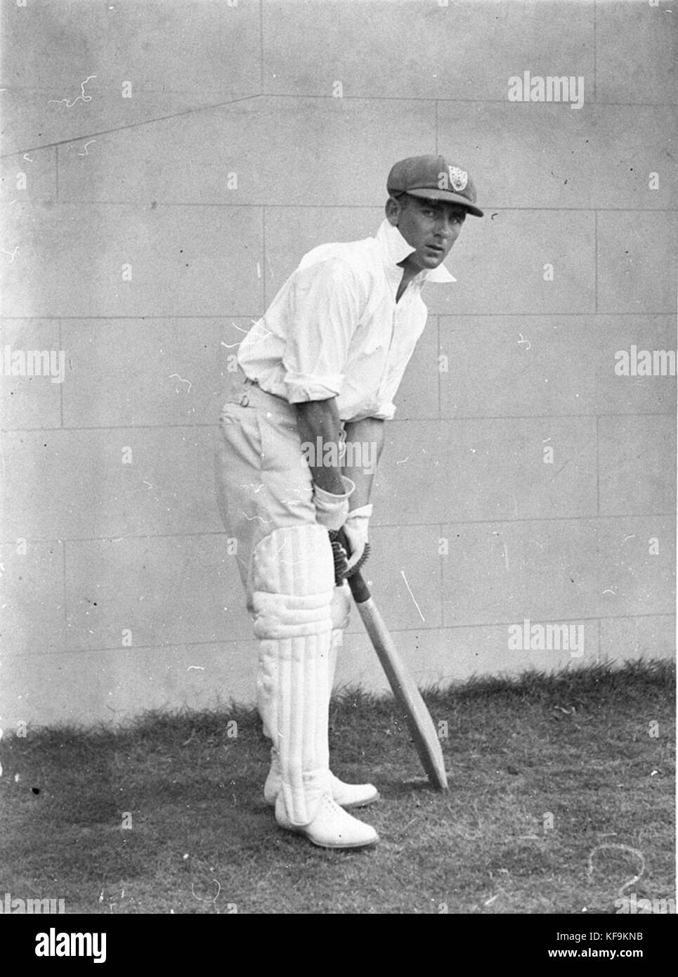 This photograph shows an unidentified cricketer in action at the wicket ...