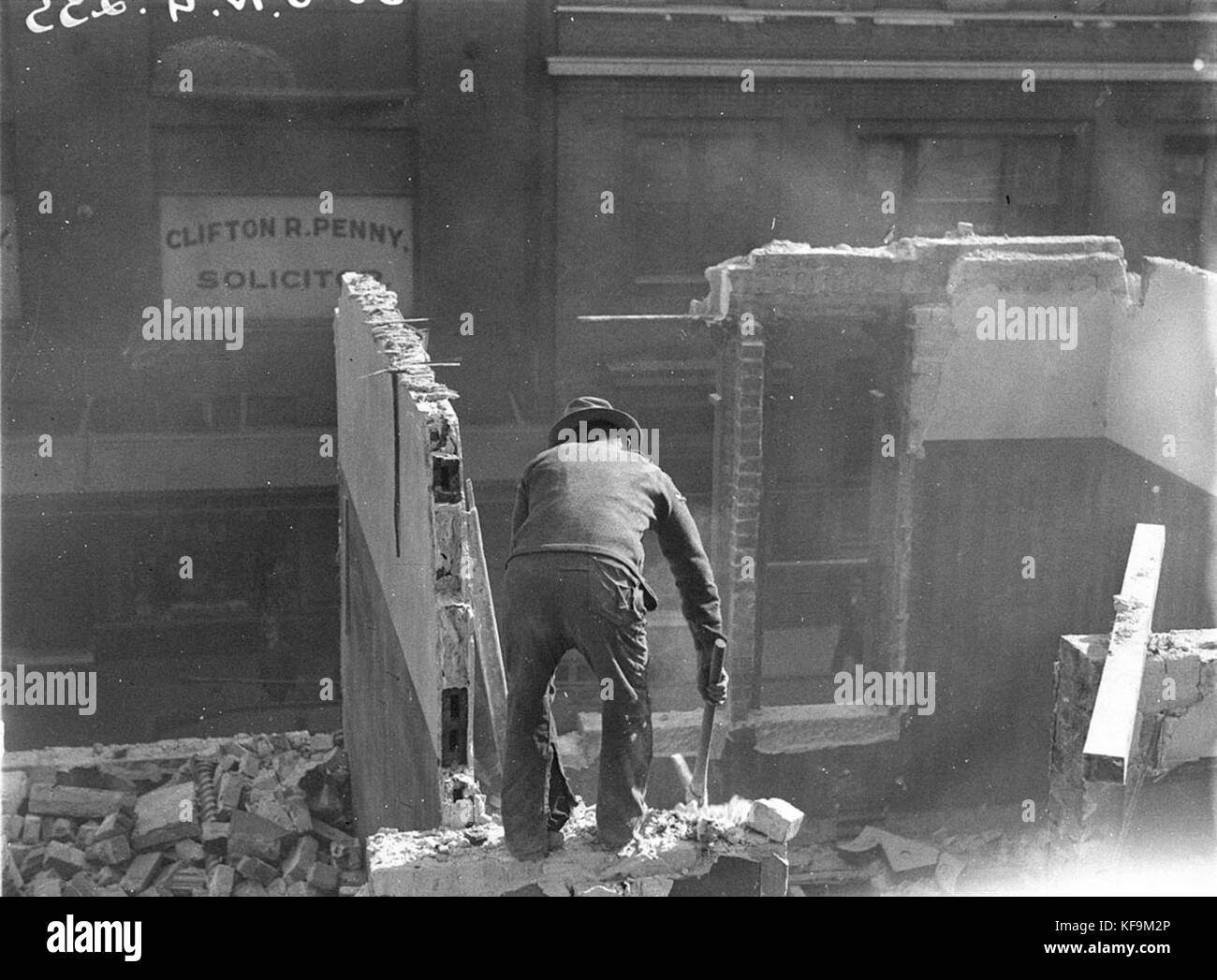 42246 Widening Elizabeth Street Workman demolishing building opposite ...