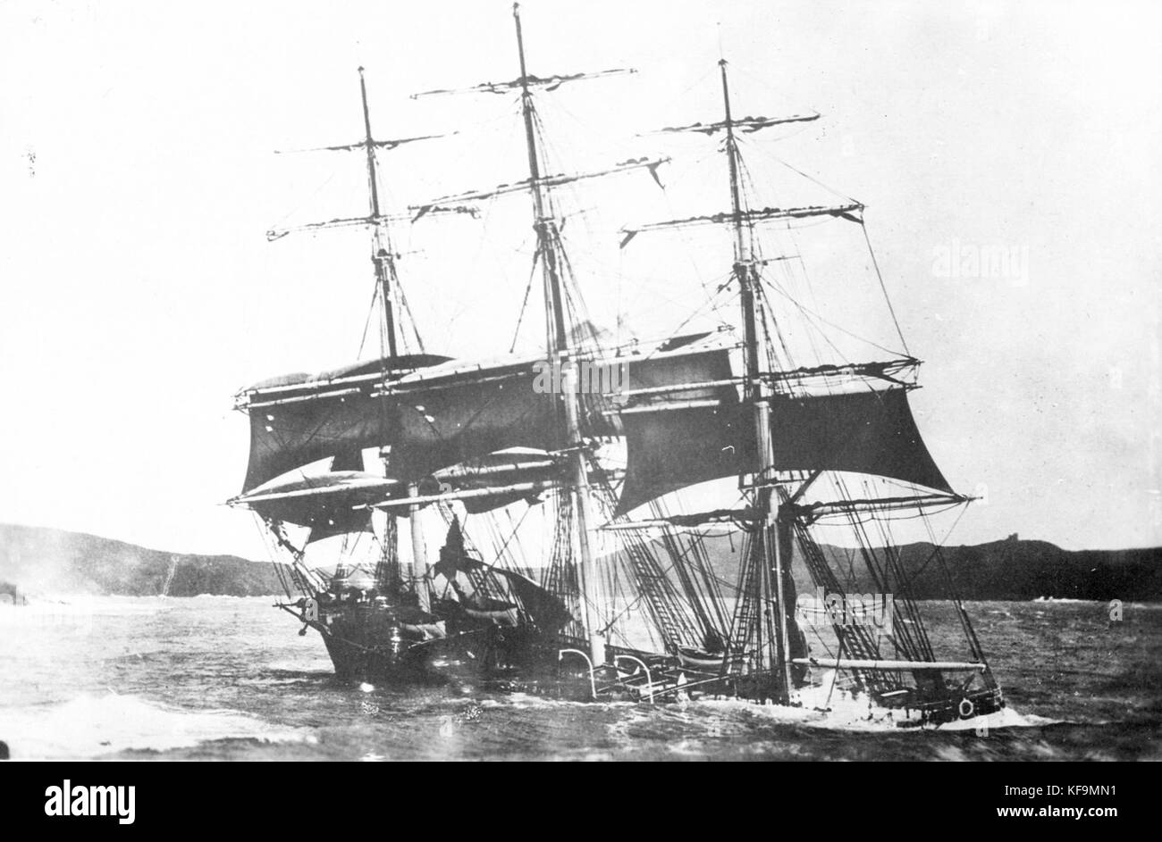 This historical photograph captures the ship *Catharine*, built in 1870 ...