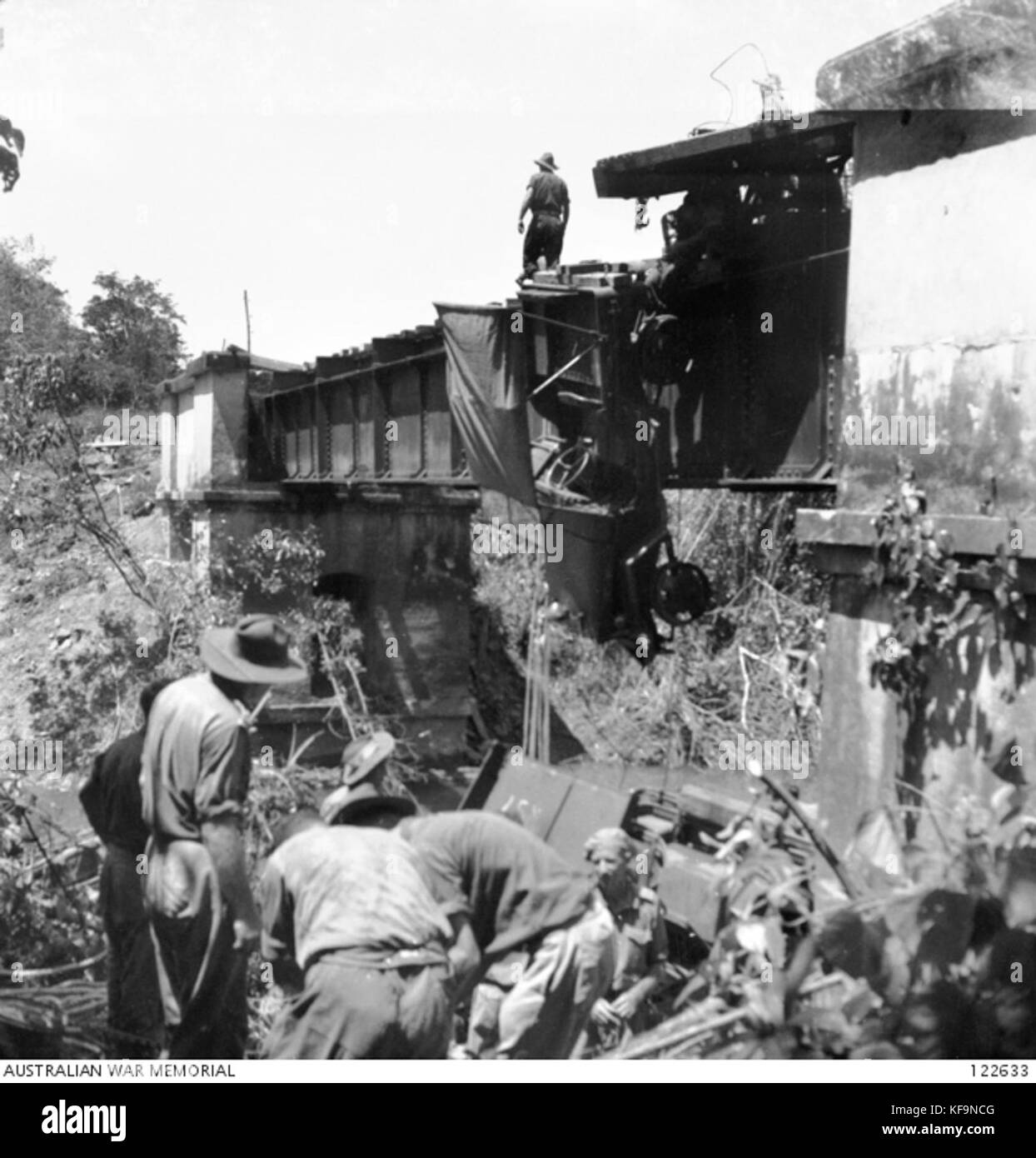 This dramatic image shows derailed jeeps hanging over the Montenier ...